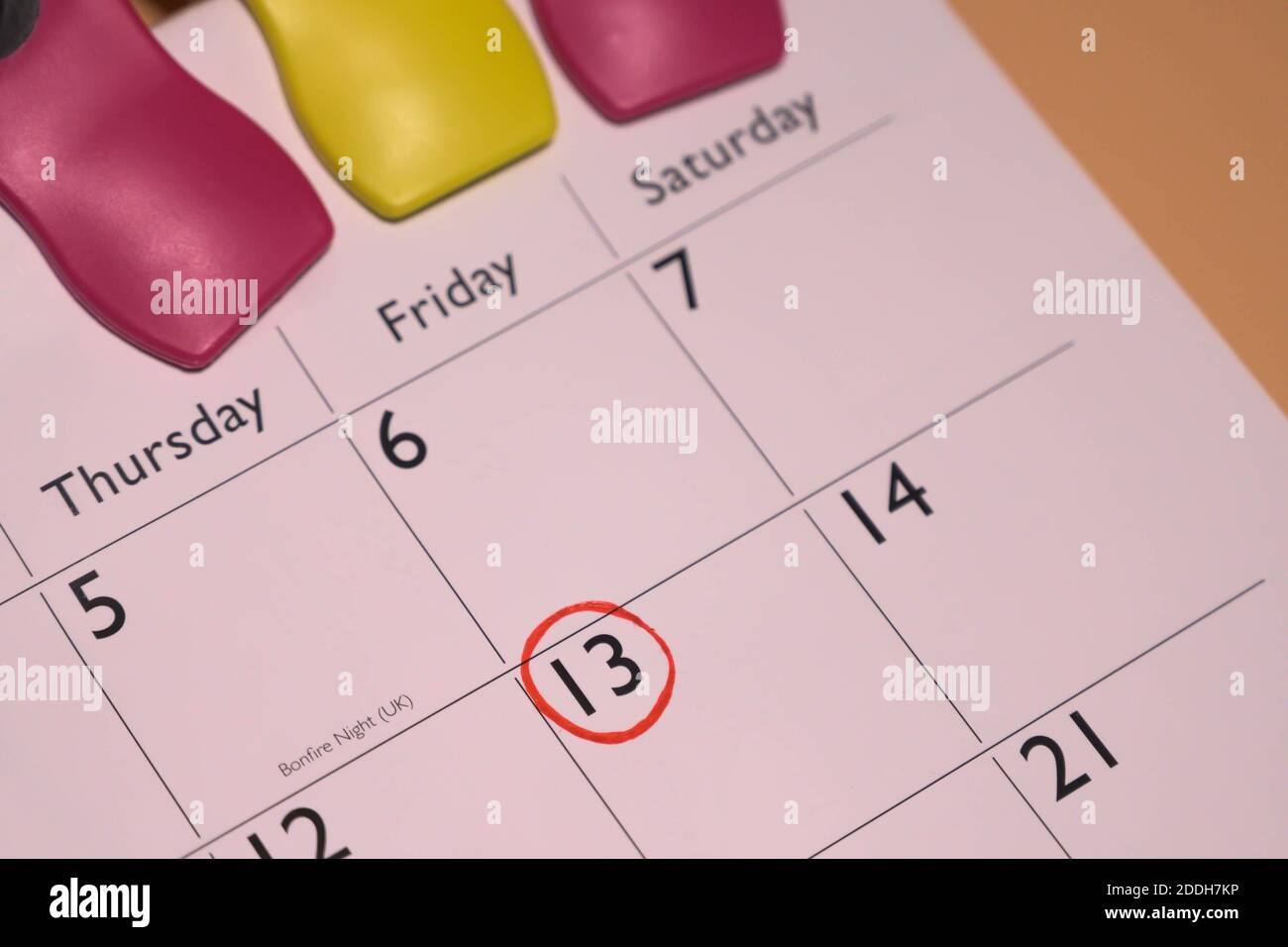 Calendar page with marked date of friday 13th Stock Photo - Alamy