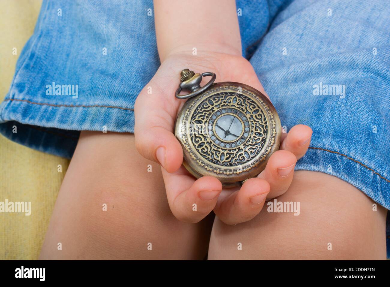 Child holding a Magnetic compass tool as a concept of traveling Stock ...