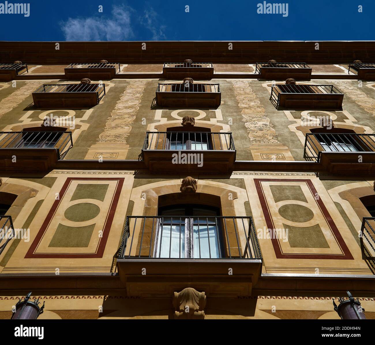 building facade with windows and small balconies Stock Photo - Alamy