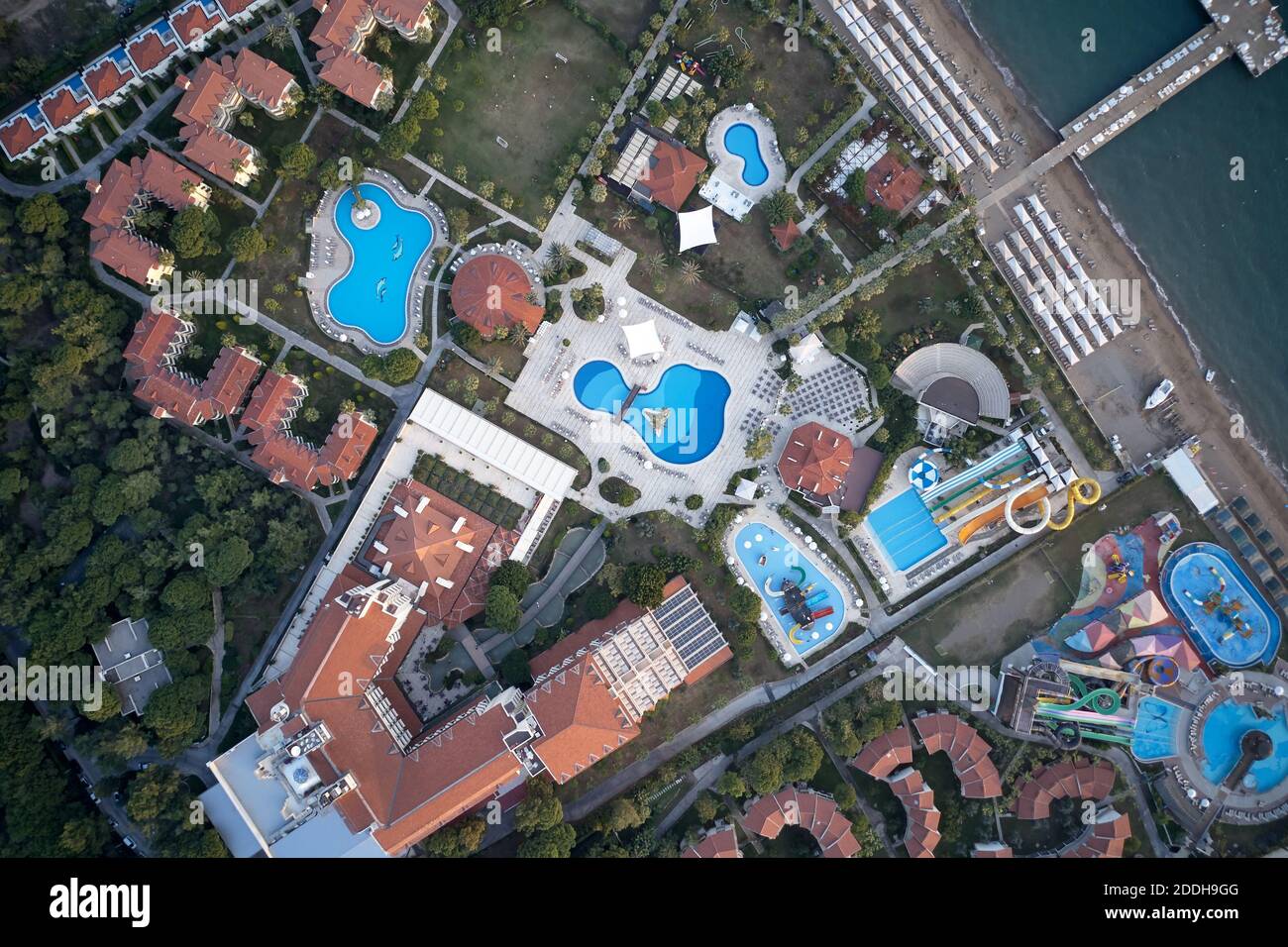 Aerial view of luxury resort hotel with swimming pools. Drone view of ...