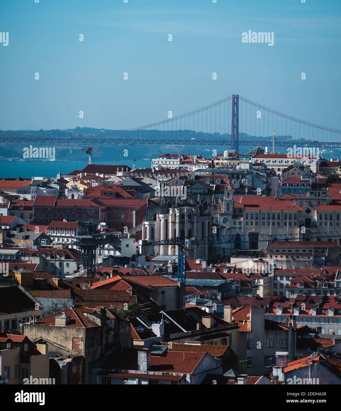 Modern traditional buildings in Lisbon downtown with 25th of April ...