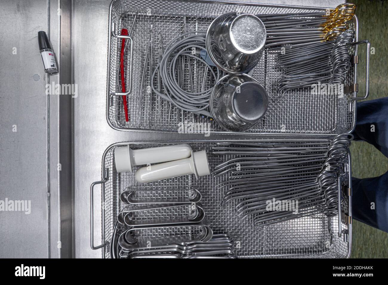 cleaned surgical instruments are sorted into instrument trays Stock ...