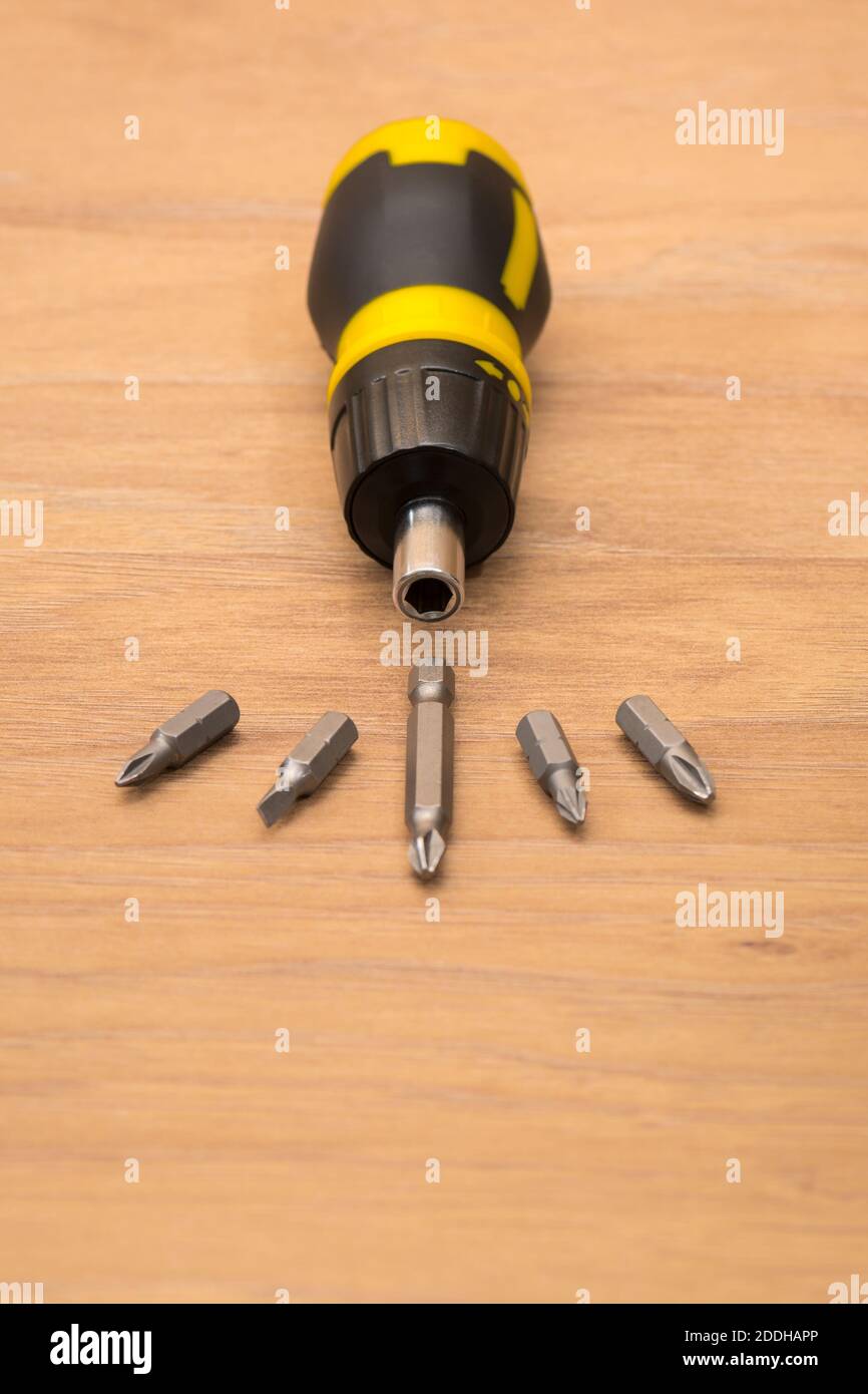 Yellow-black handle screwdriver still life. Detailed macro photography ...