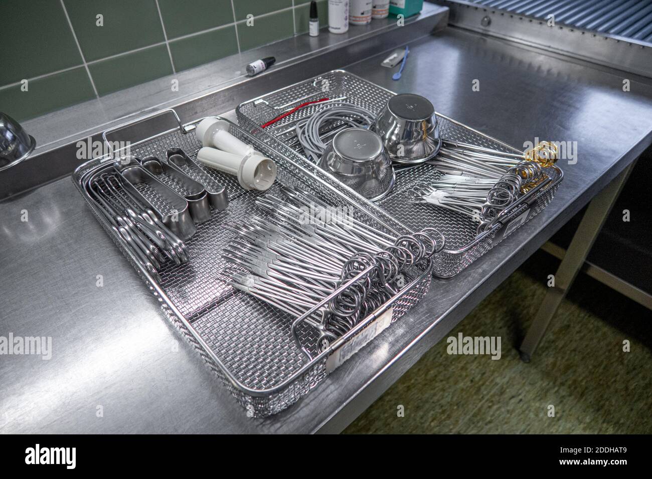 cleaned surgical instruments are sorted into instrument trays Stock ...