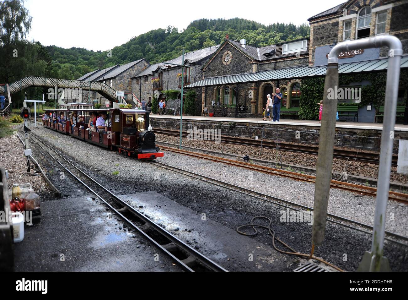 7.25" gauge train on the museum line with the Network Rail station in ...