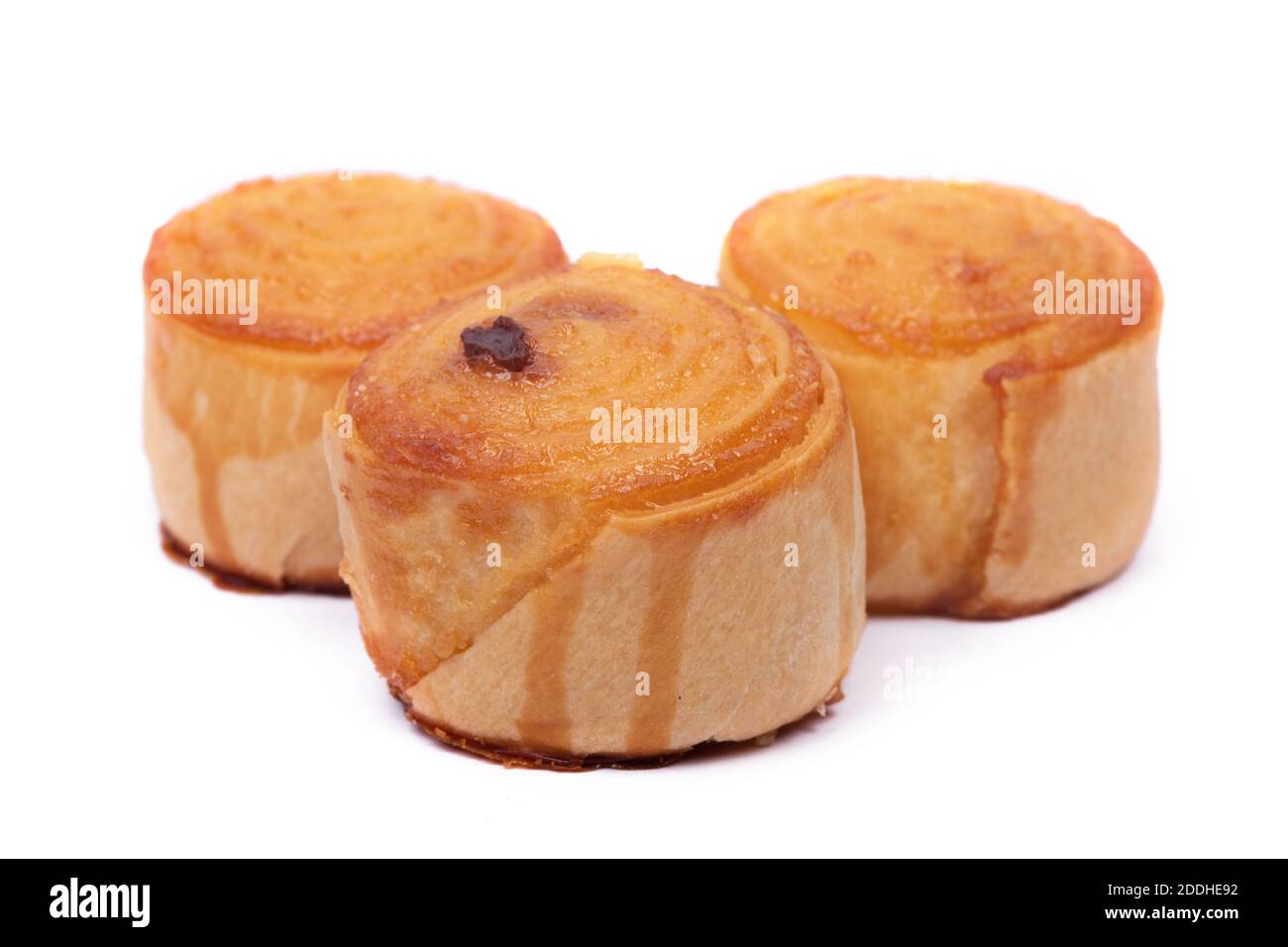 Group of rolled pastries isolated over white background Stock Photo - Alamy