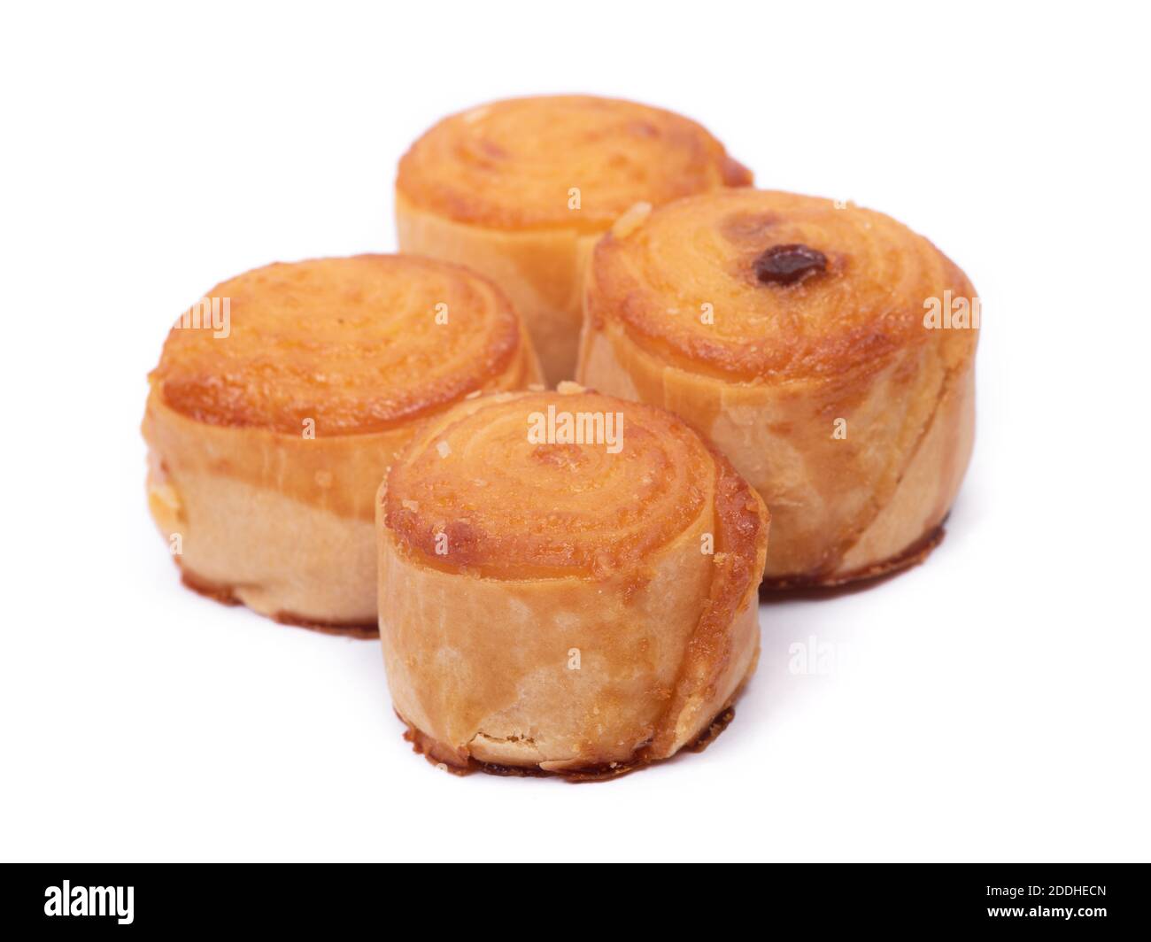 Group of rolled pastries isolated over white background Stock Photo - Alamy