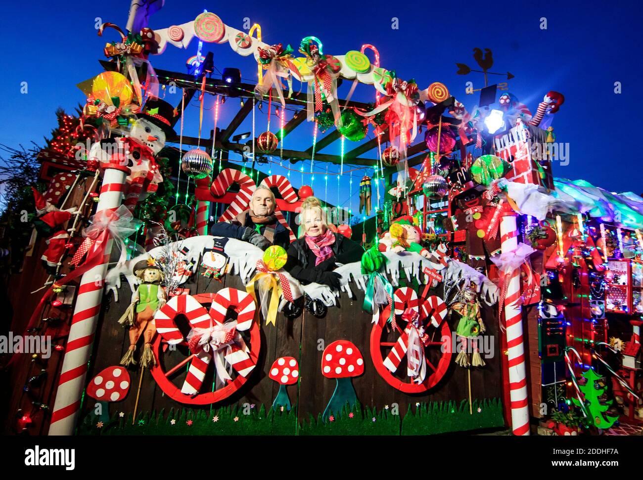 Rod and May Proctor with their candy themed Christmas decorations at ...