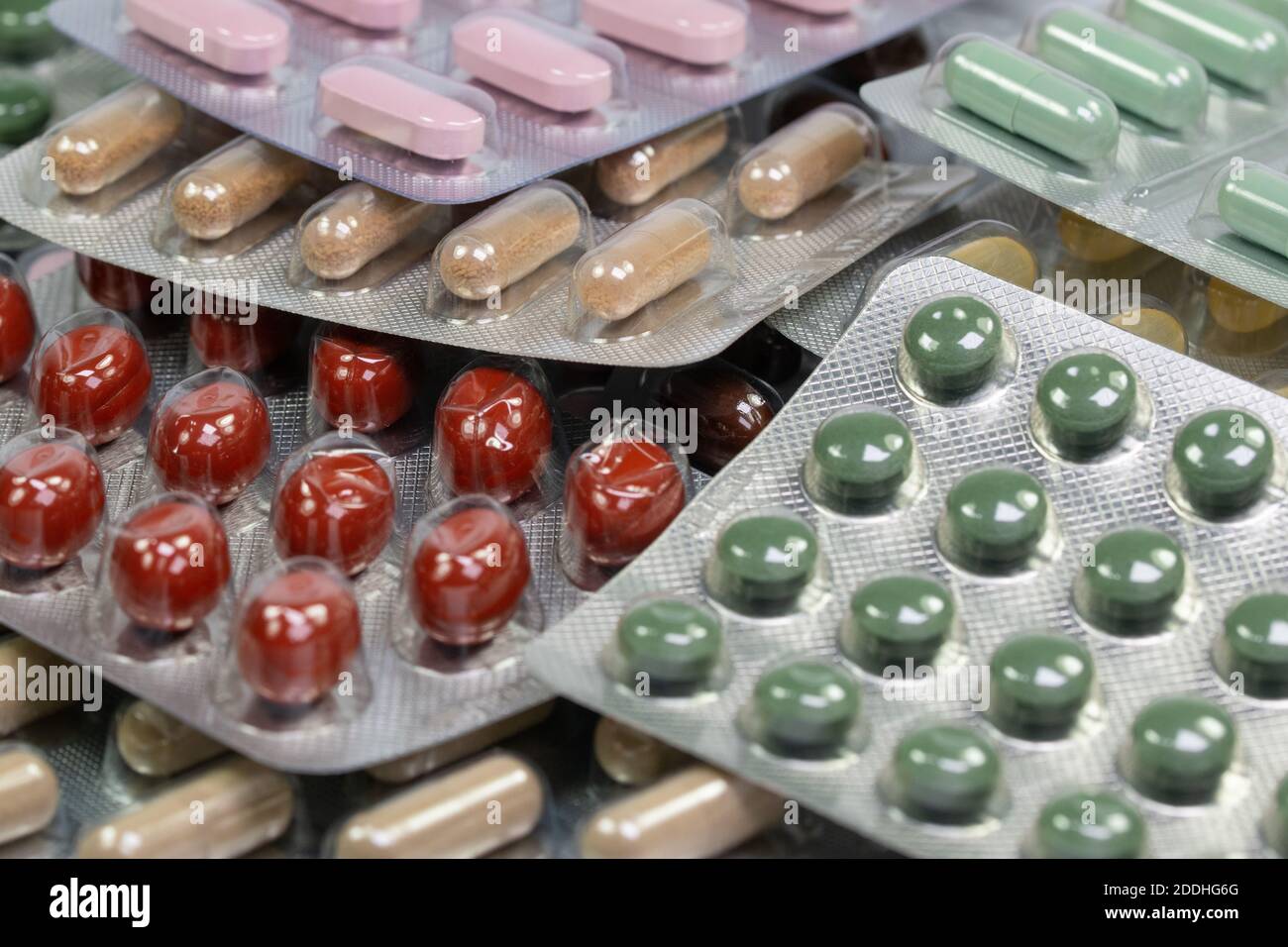Lots of colorful tablets, medicines in a close-up Stock Photo - Alamy