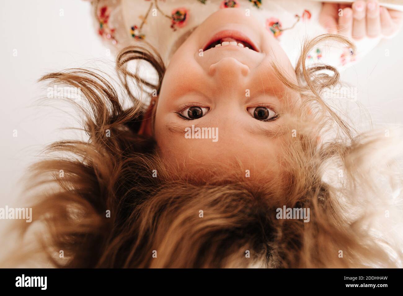 Girl hanging head down from hi-res stock photography and images - Alamy