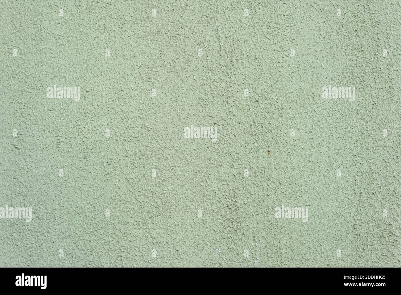 green old texture of plaster on the wall of a street house Abstract ...