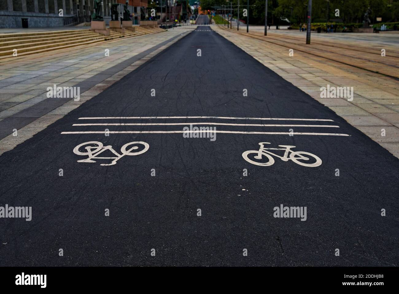 Urban bike path with icons on the asphalt. . High quality photo Stock ...
