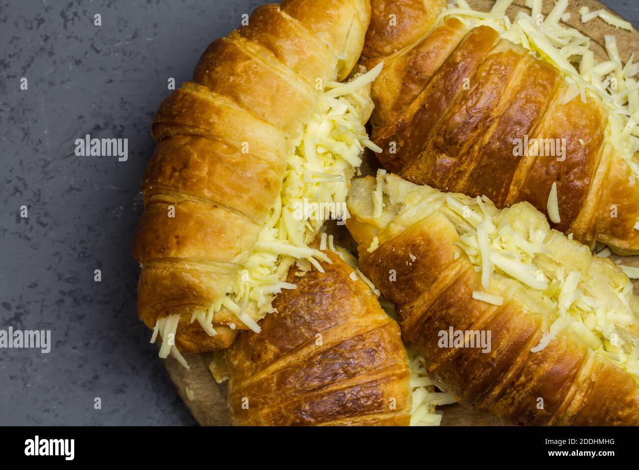 Croissants with cheese filling close up - top view image with copy ...