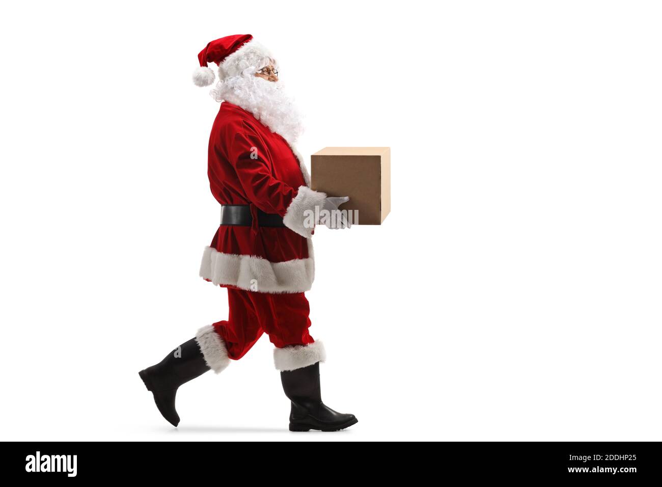 Full length profile shot of santa claus carrying a cardboard box ...