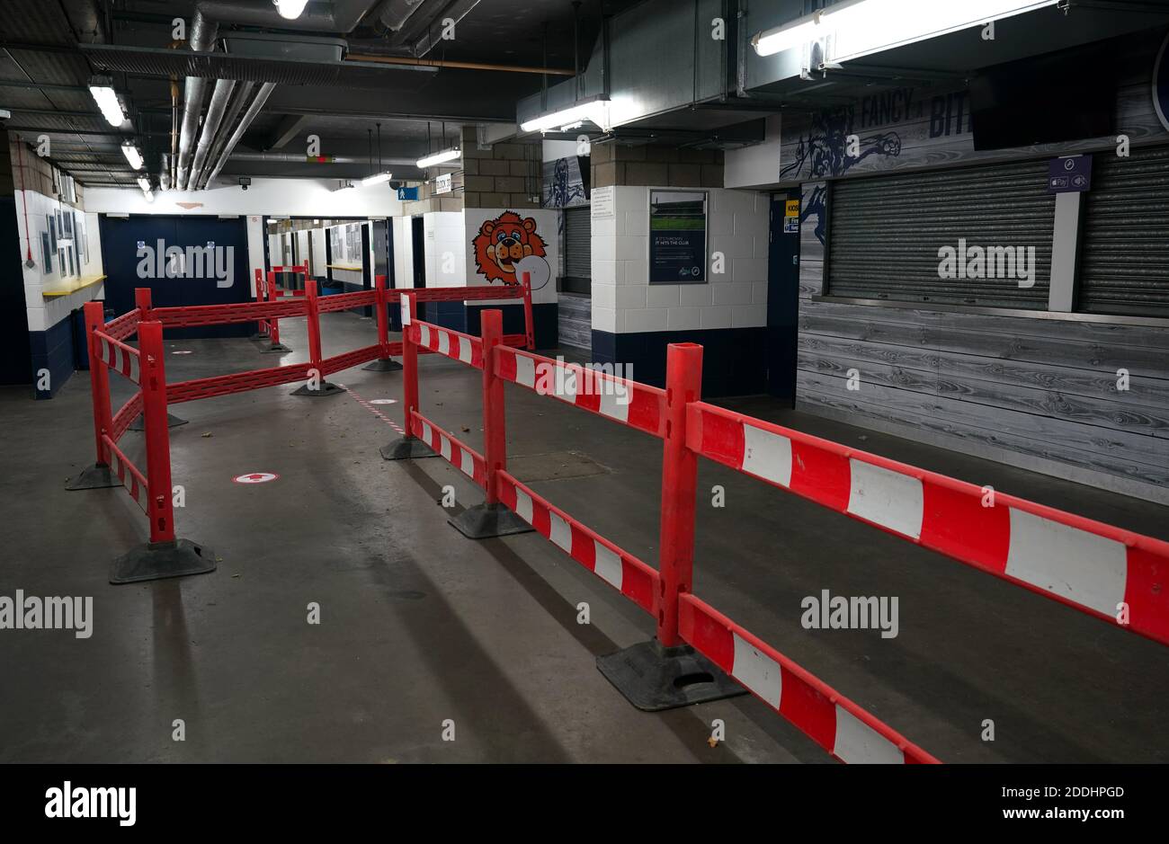 A view of a queueing system in place near a snack bar in the concourse ...