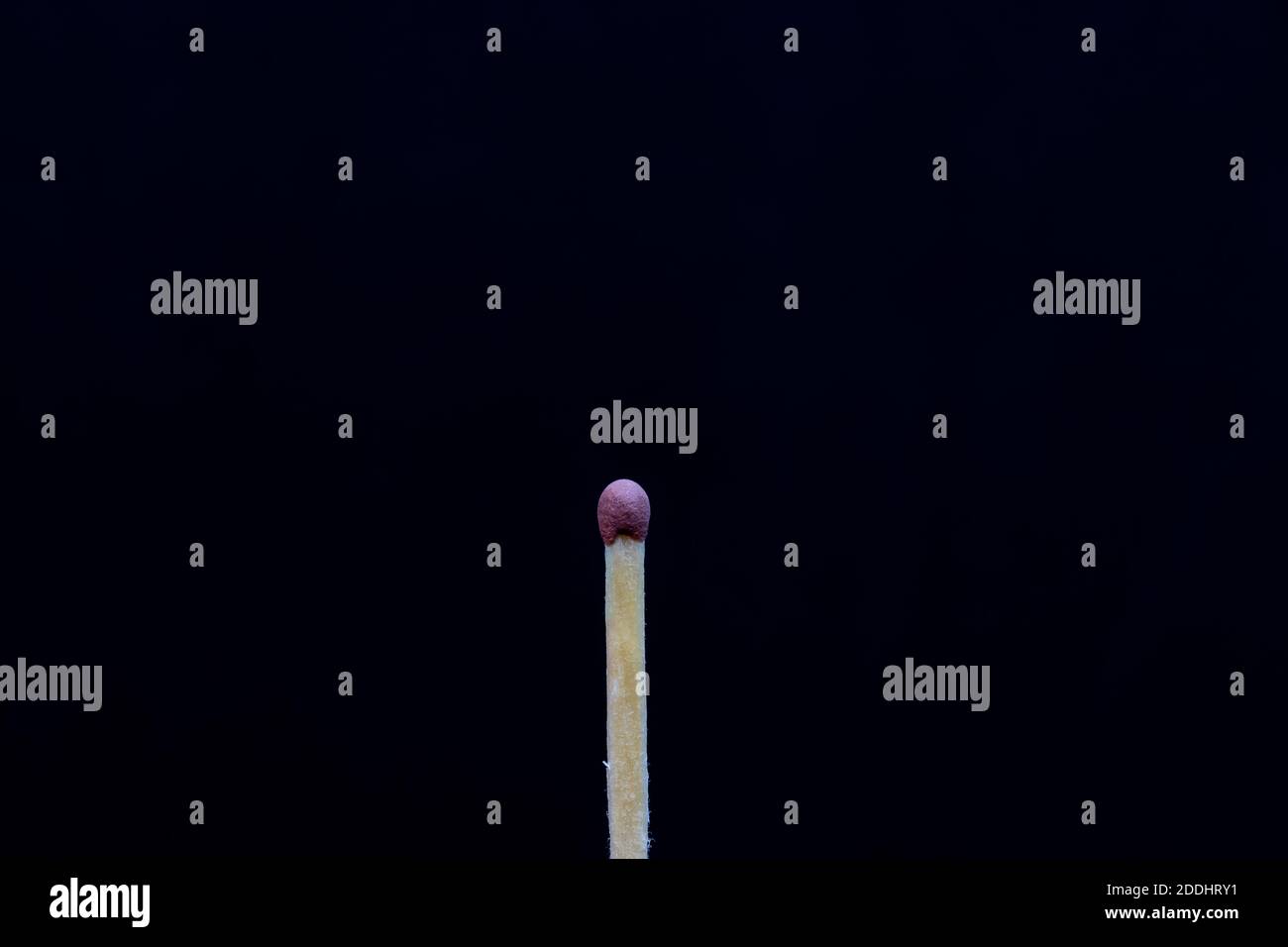 Single matchstick isolated on black background Stock Photo - Alamy