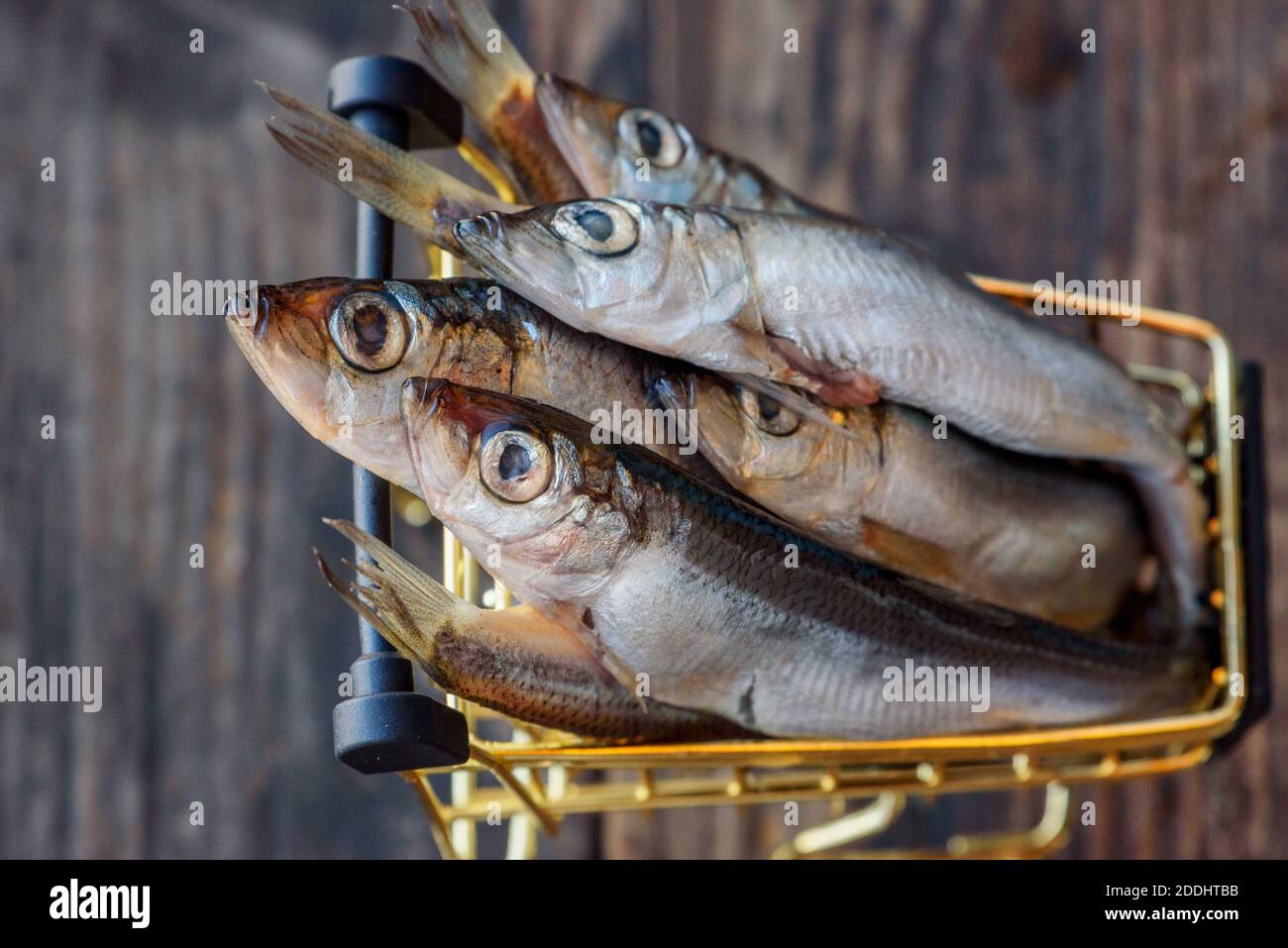 Fresh sprat. Sprat in the grocery cart. A fish Stock Photo - Alamy