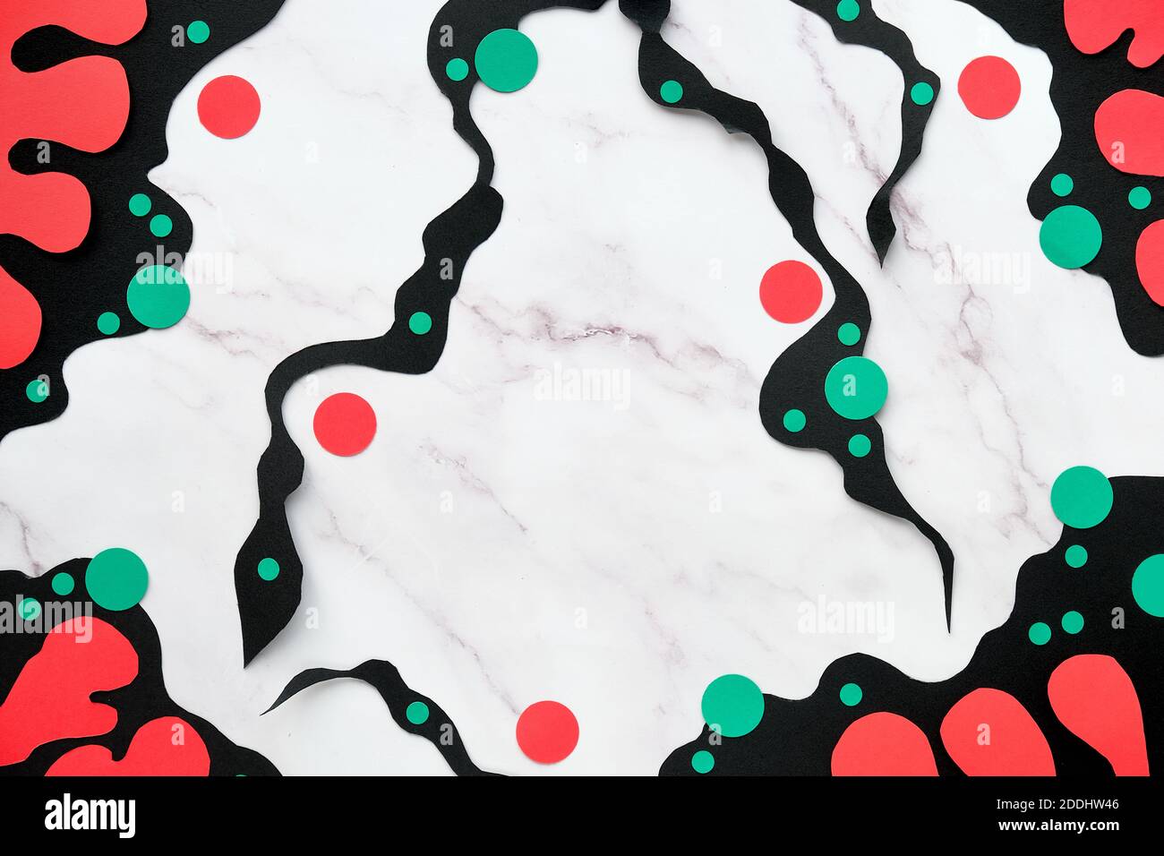 Abstract organic forms in red, green, black on marble. Background with ...