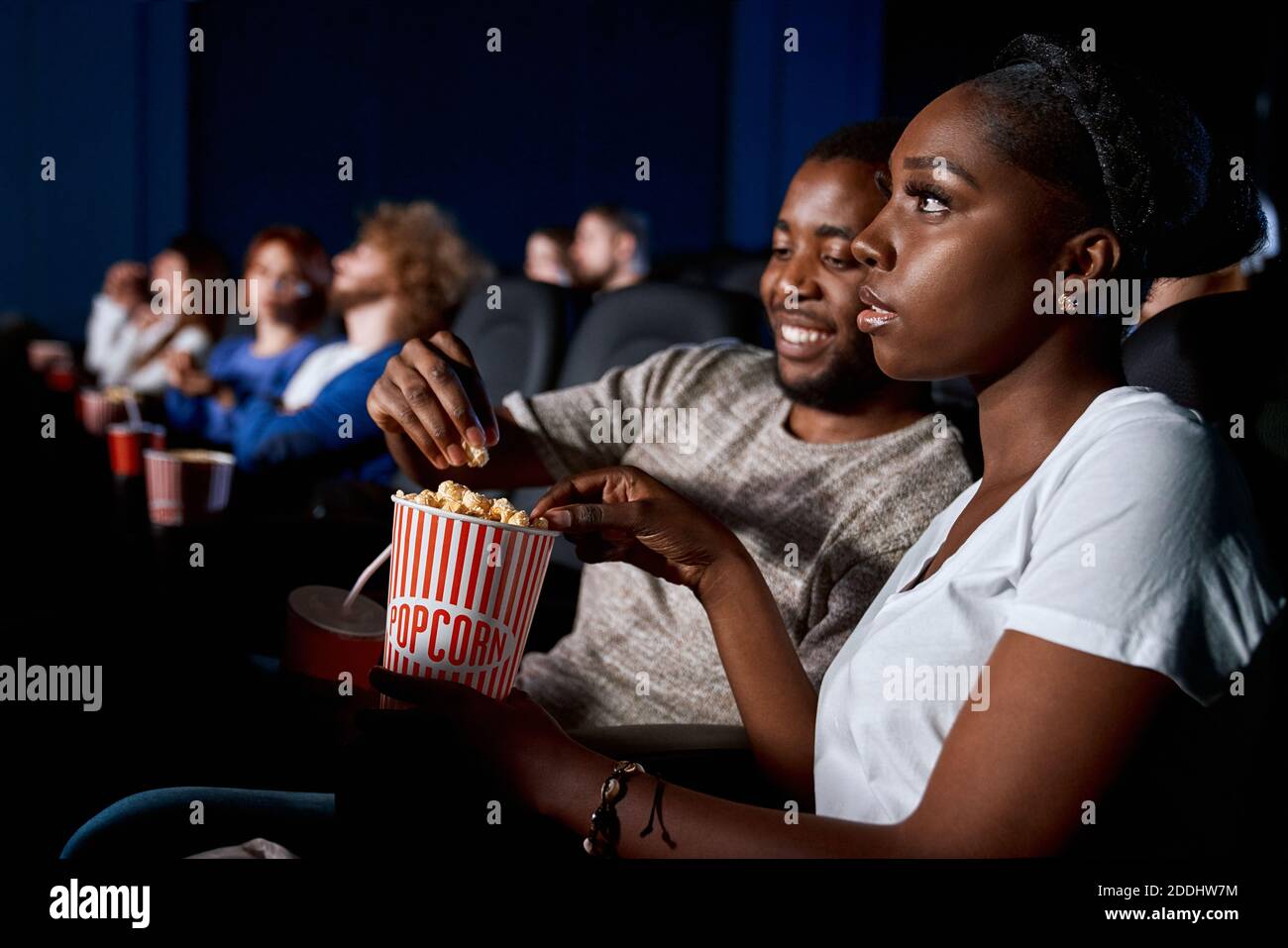 Sharing popcorn hi-res stock photography and images - Alamy