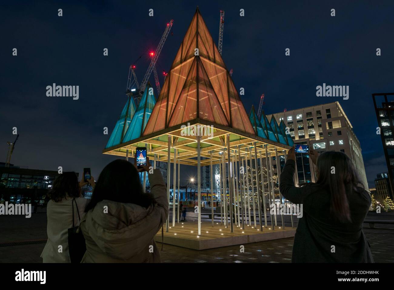 London, UK. 25 November 2020. Visitors view The Electric Nemeton Tree ...