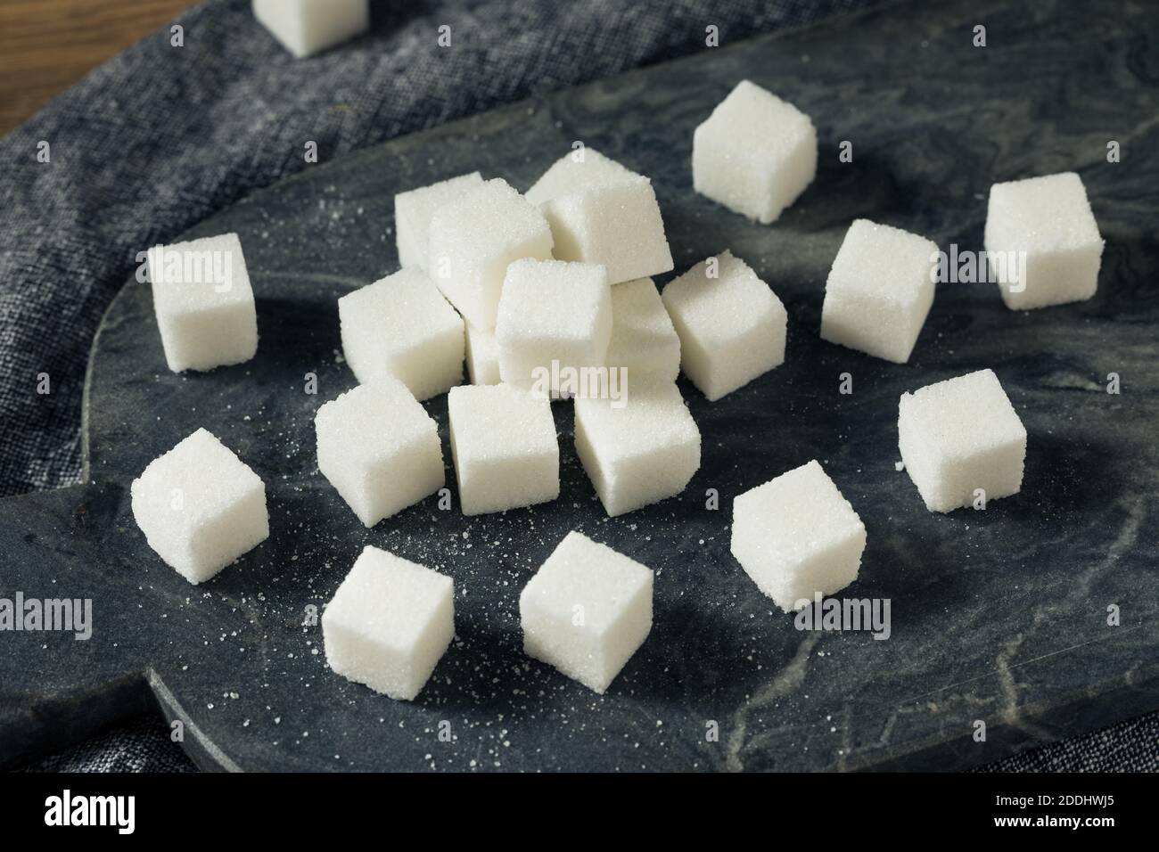 Sweet Organic White Sugar Cubes in a Bunch Stock Photo - Alamy
