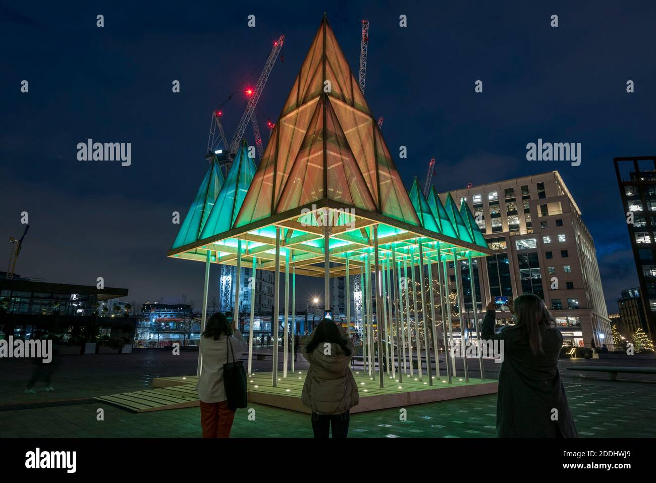 London, UK. 25 November 2020. Visitors view The Electric Nemeton Tree ...