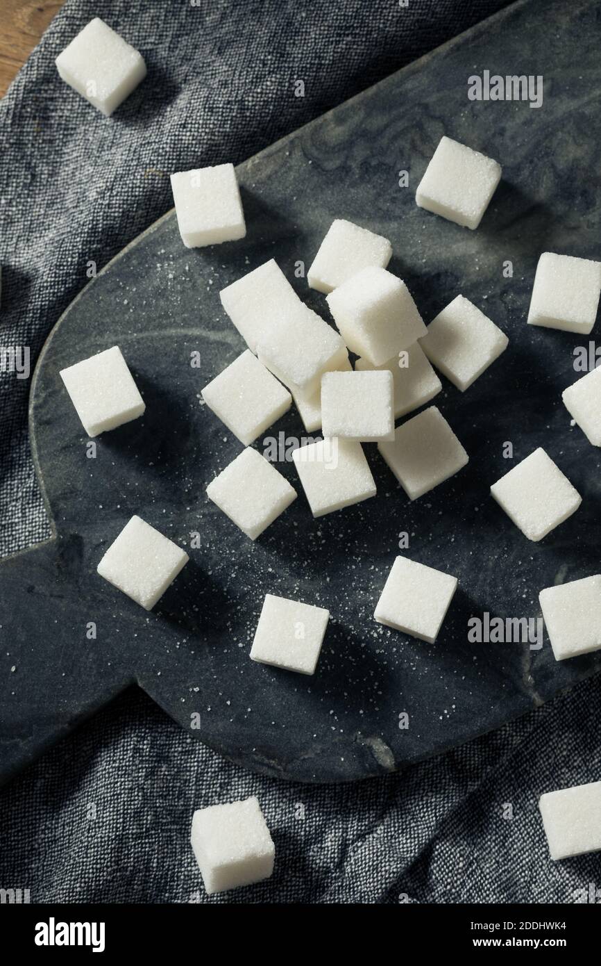 Sweet Organic White Sugar Cubes in a Bunch Stock Photo - Alamy