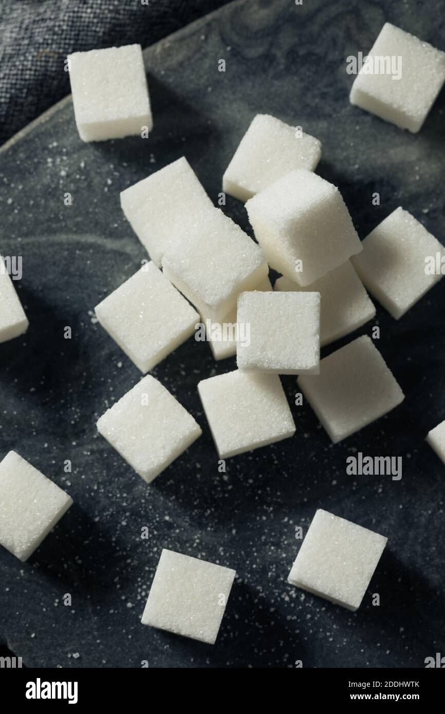 Sweet Organic White Sugar Cubes in a Bunch Stock Photo - Alamy