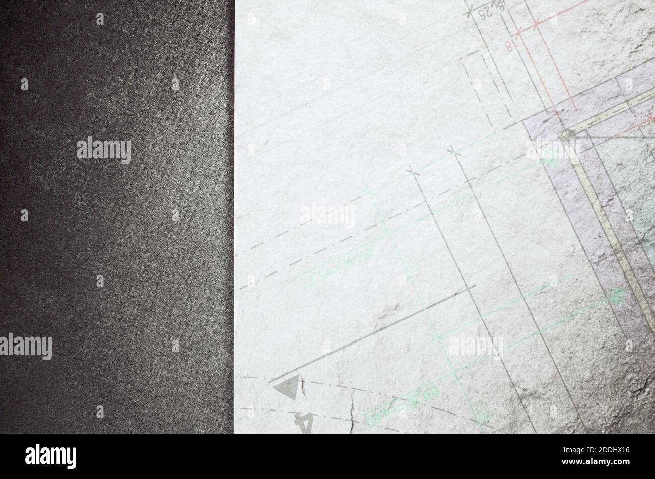 A closeup of a bright and dark-toned textured rough stone background ...