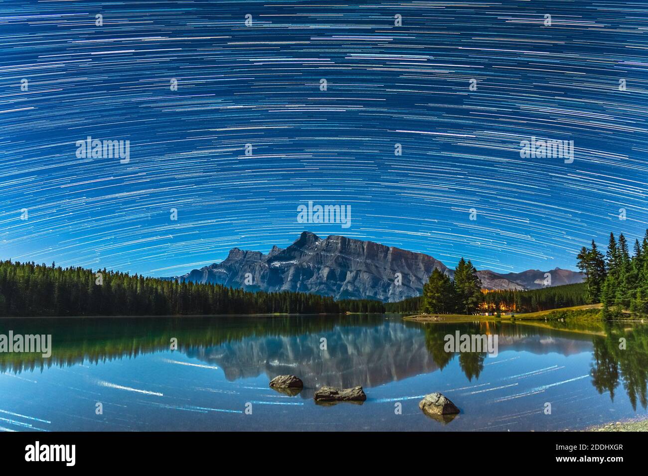 Beautiful star trails above the Mount Rundle from Two Jack Lake at ...