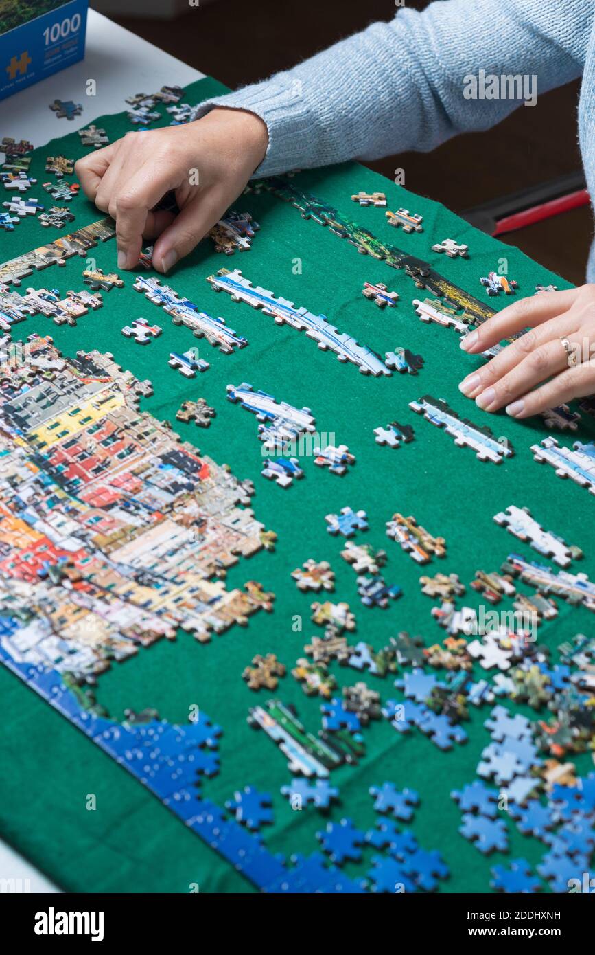 Jigsaw puzzle woman hi-res stock photography and images - Alamy