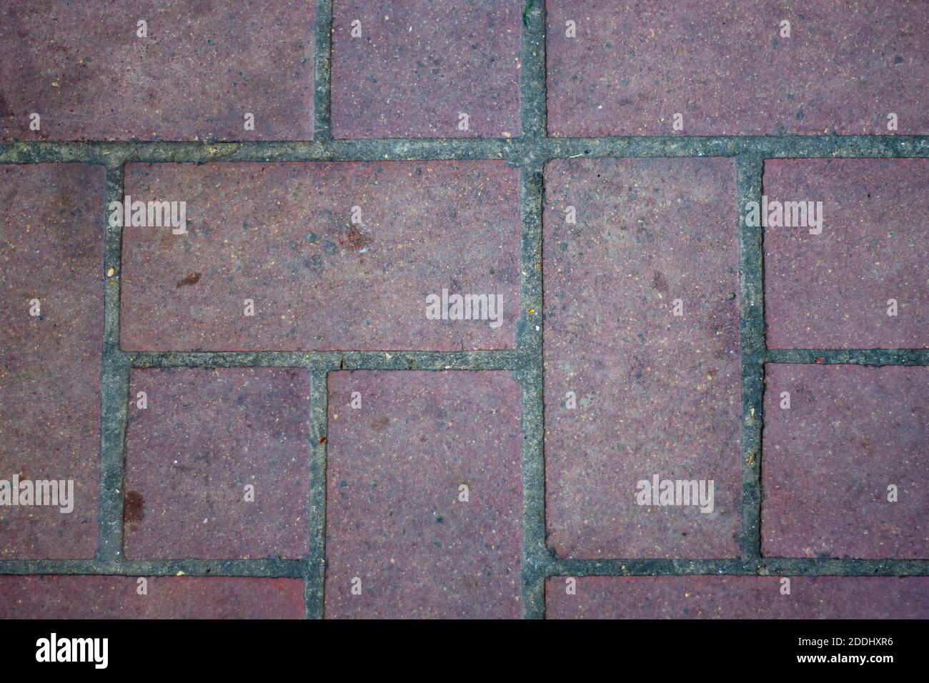 Brick pattern red tiles close up shot in a foot path Stock Photo - Alamy