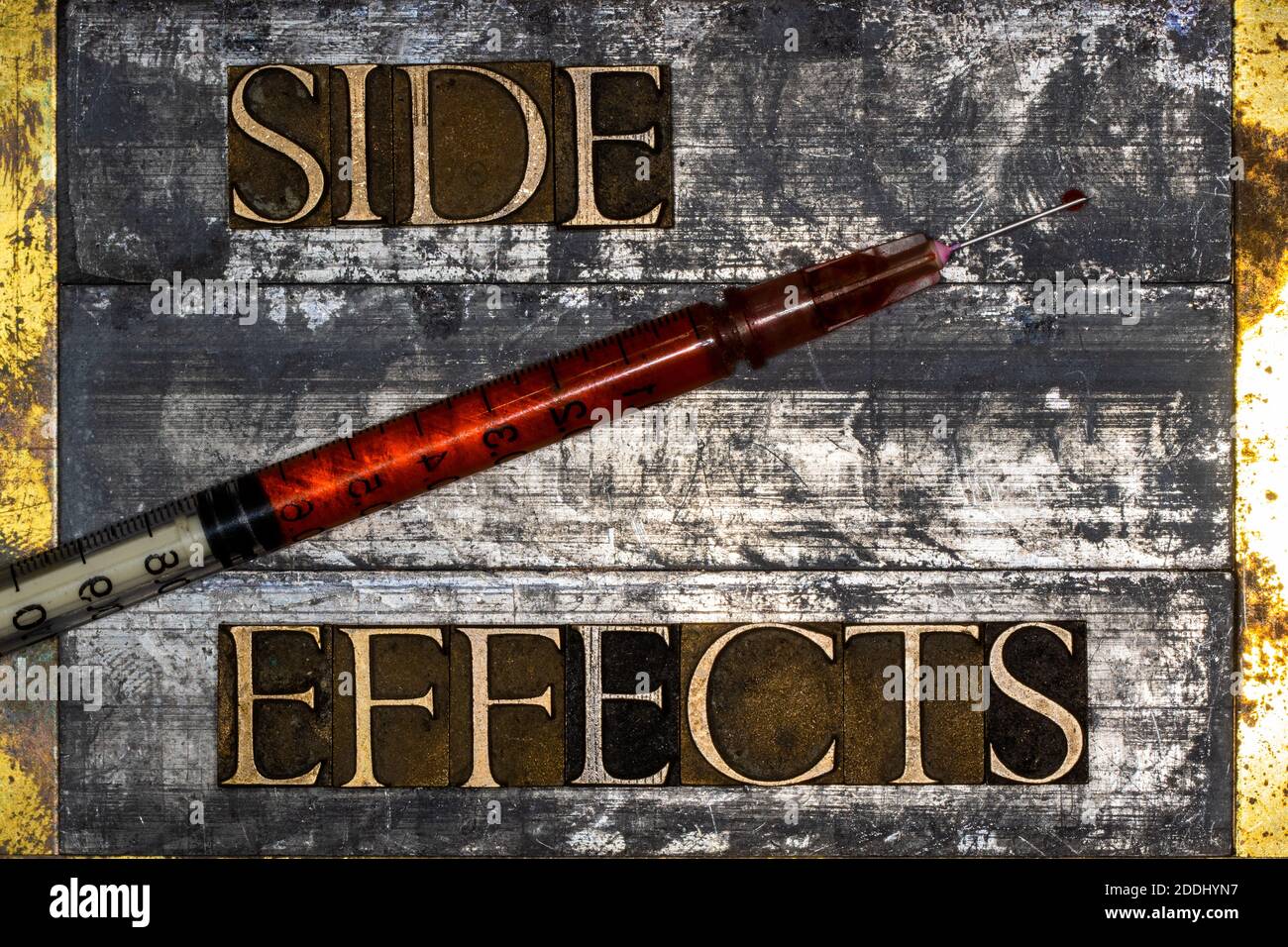 Side Effects text message on textured lead grunge copper and vintage ...
