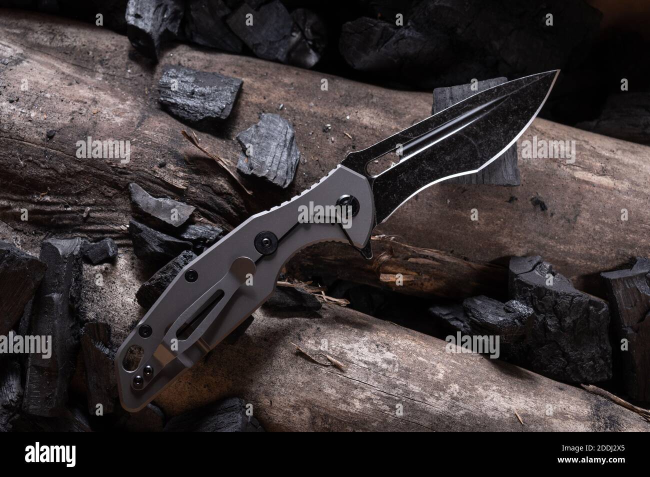 The reverse side of the knife. Knife with a clip for carrying. An army ...