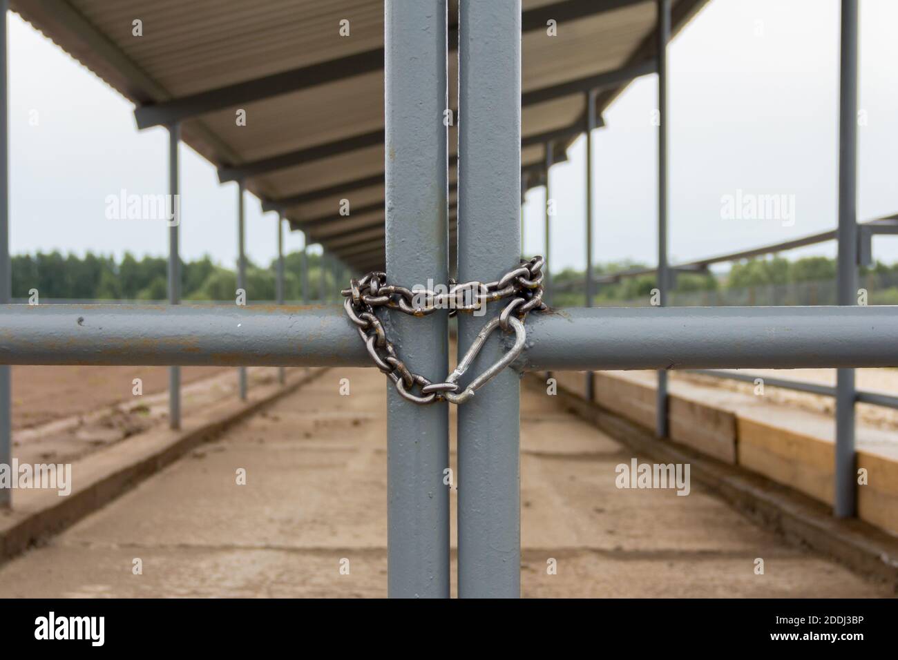 Chain wound around the gate at the entrance. Closed area. No way Stock ...