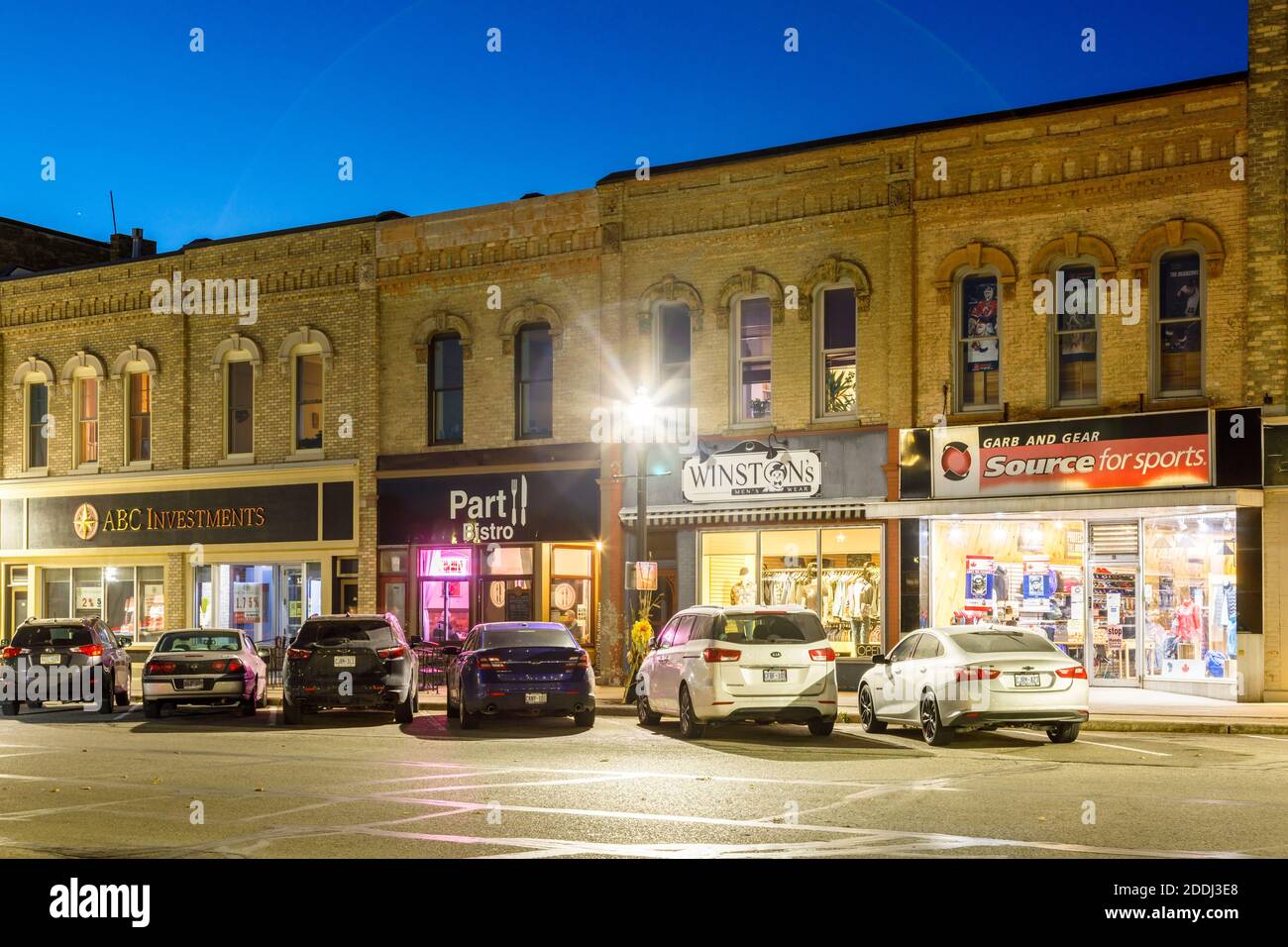 Historical buildings at Courthouse Square at dusk in Downtown Goderich ...
