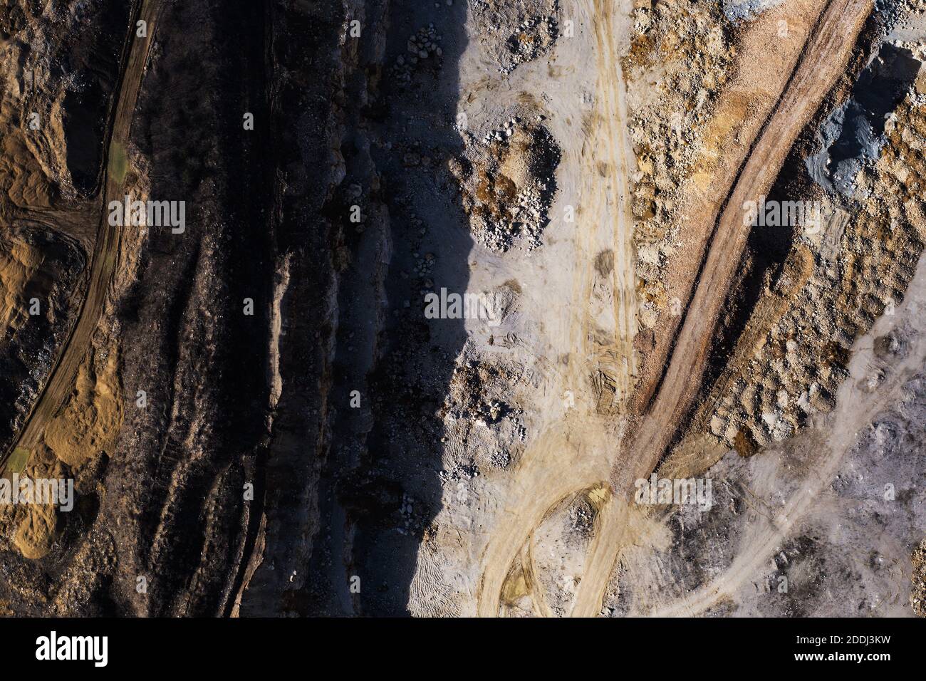 Working quarry environment seen from a drone. Amazing colorful patterns ...