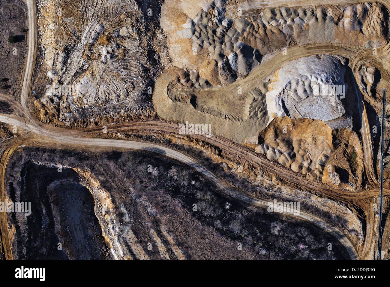 Working quarry environment seen from a drone. Amazing colorful patterns ...