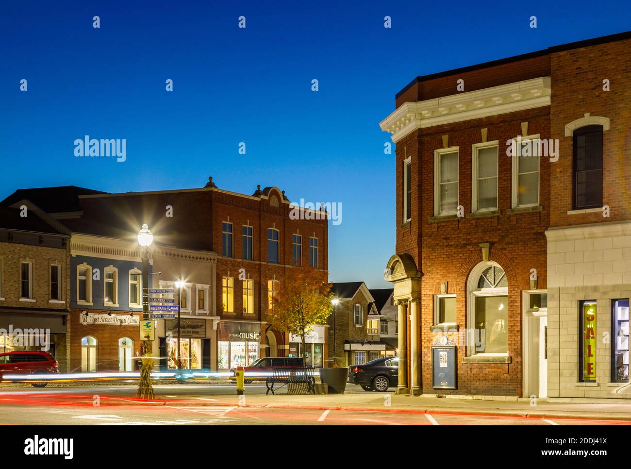 Historical buildings at Courthouse Square at dusk in Downtown Goderich ...