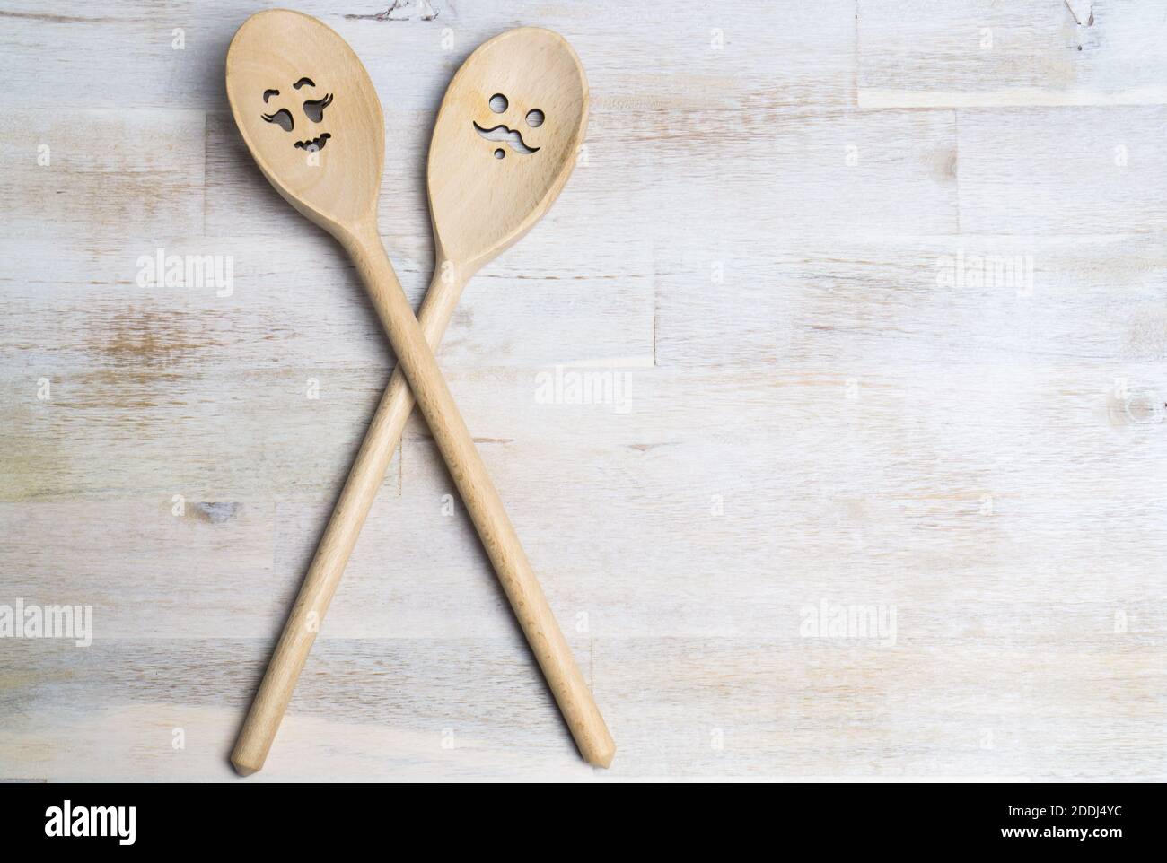 A top view of wooden spoons with funny face Stock Photo - Alamy
