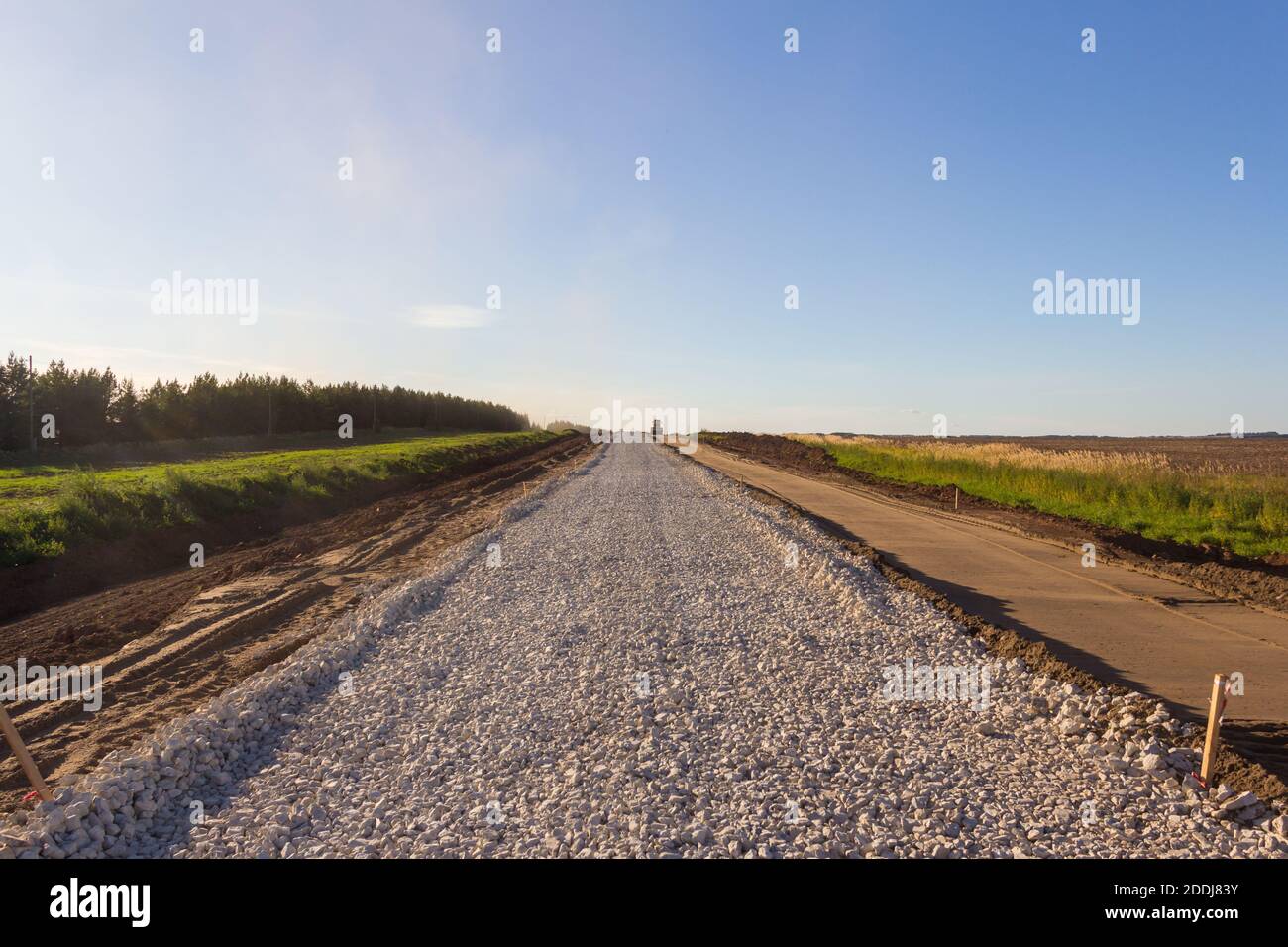 Construction of a new road. One of the gravel layers when paving new ...
