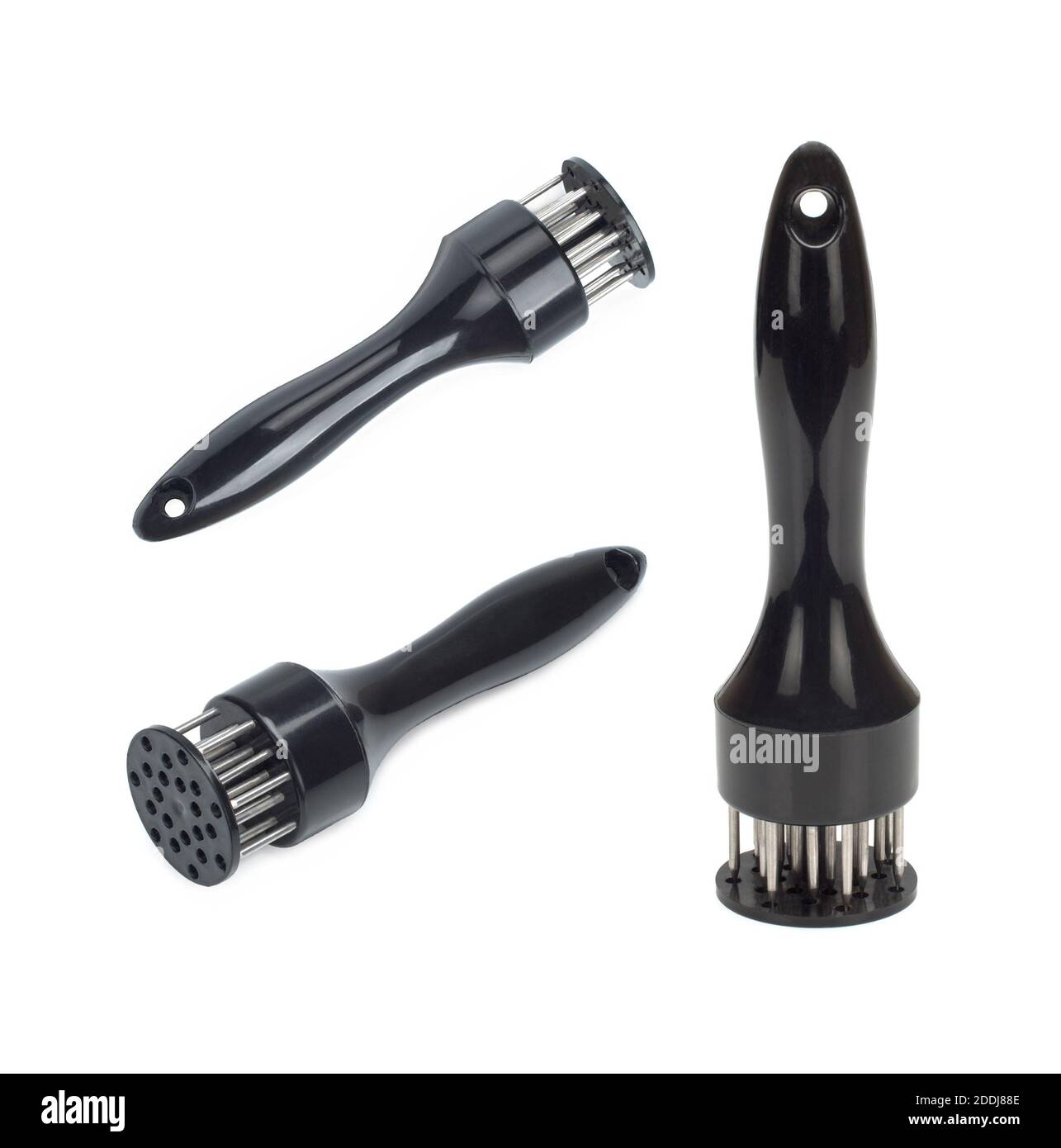A hand-powered meat tenderizer for puncture the meat and cut into the ...