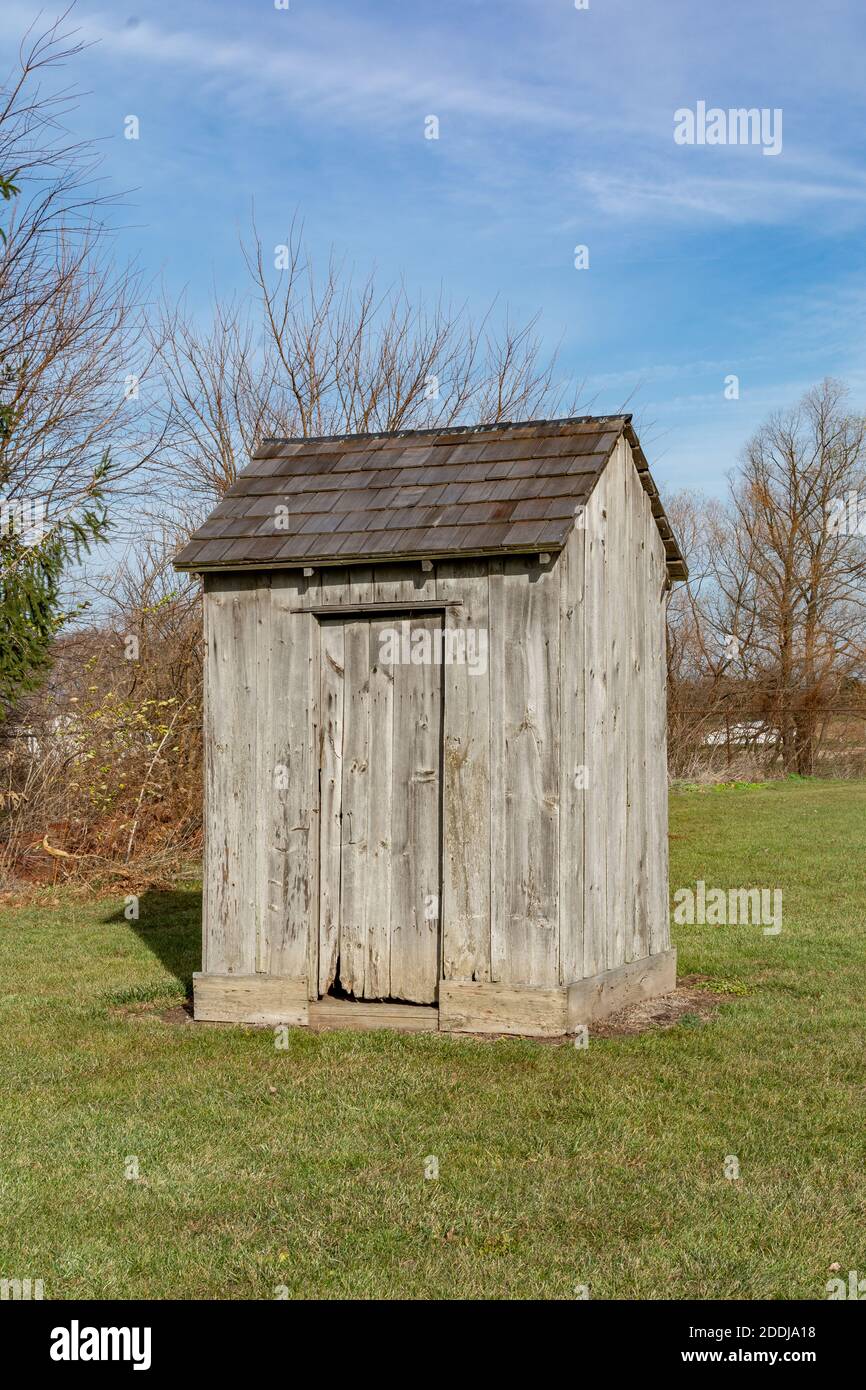 Old deserted outhouse located near an abandoned one room schoolhouse ...
