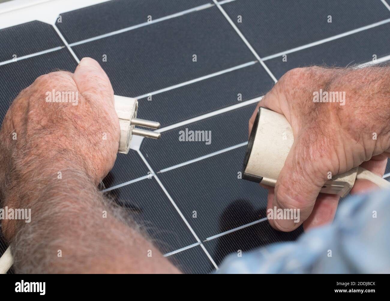 a power plug and solar panel, sustainable and ecological energy ...