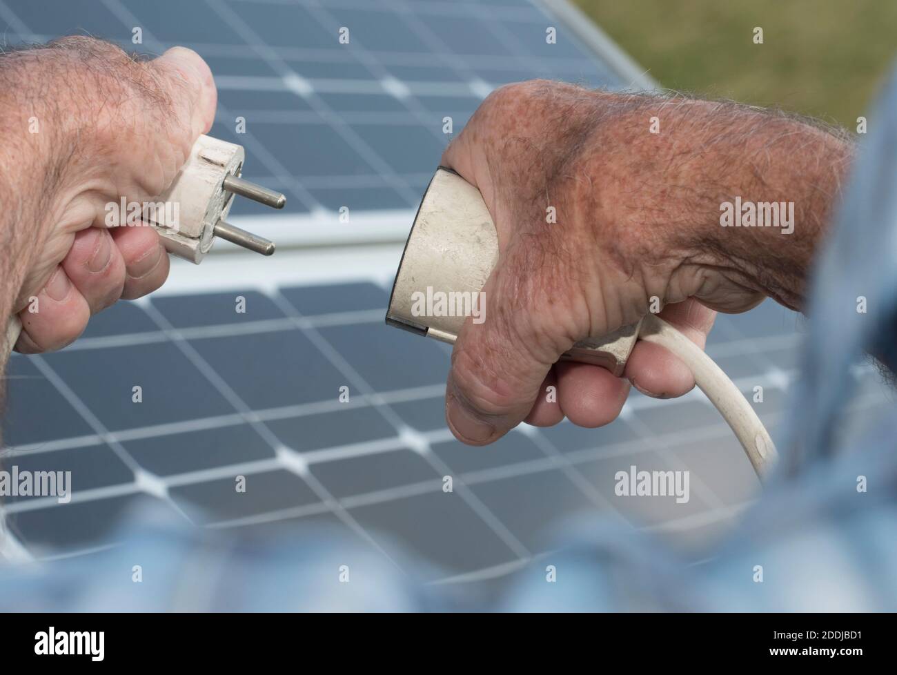 a power plug and solar panel, sustainable and ecological energy ...