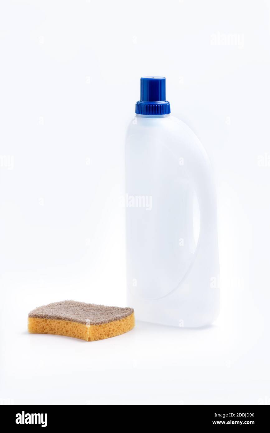 White Detergent plastic bottle with chemical and cleaning sponge on ...