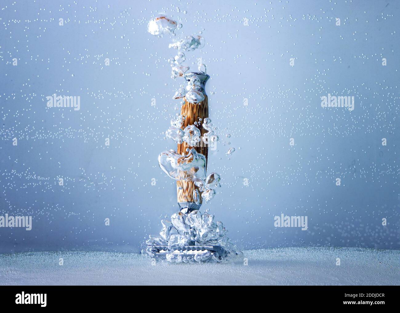 razor and water splash in water Stock Photo - Alamy