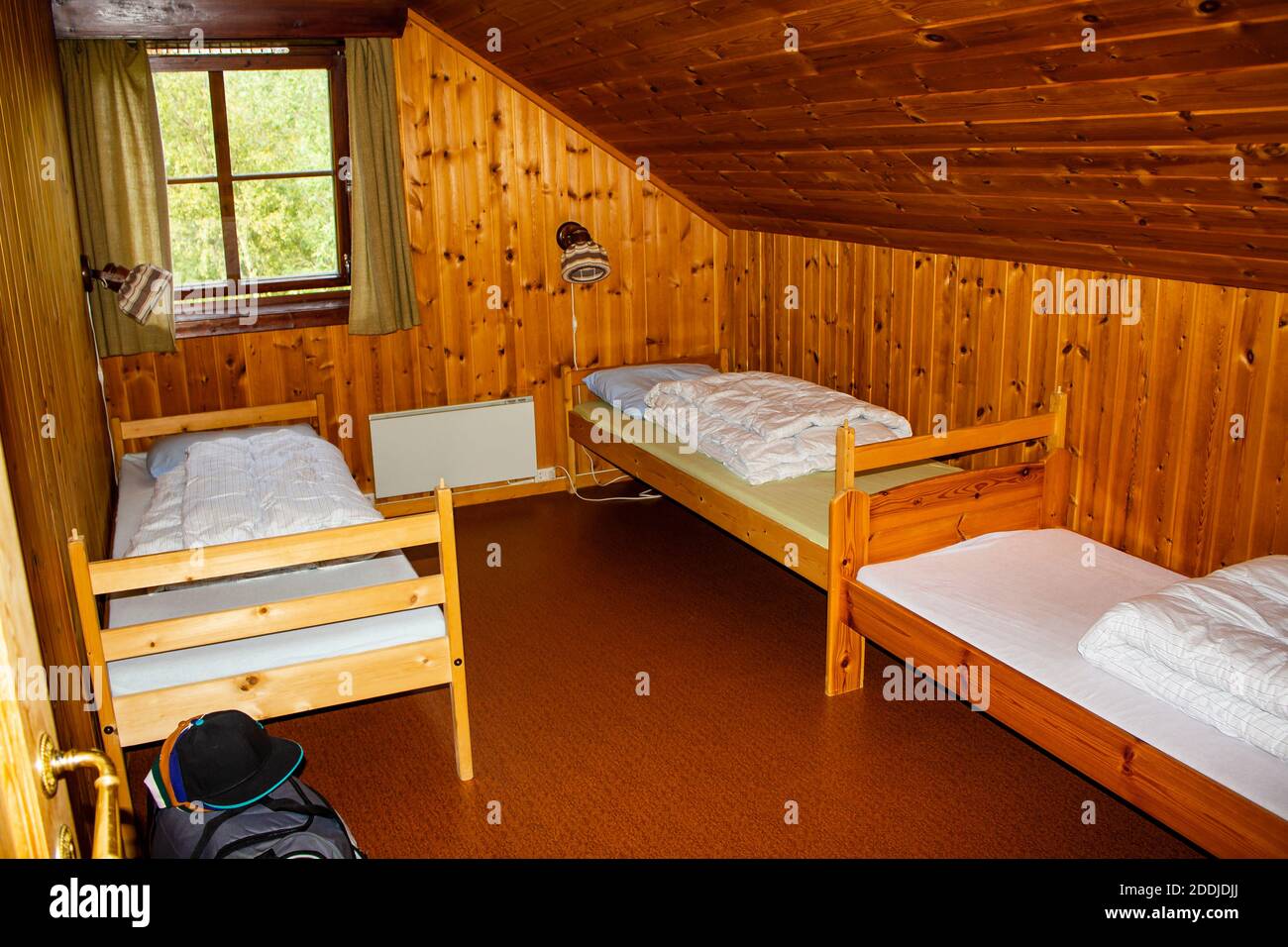 Traditional Bed In Cottage Bedroom High Resolution Stock Photography ...