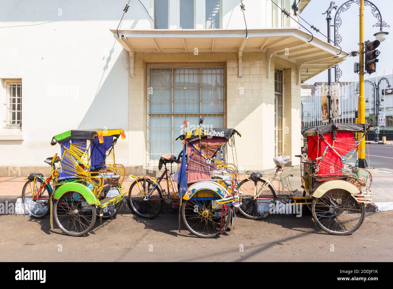 Three local tricycles called becak is a popular human powered vehicle ...