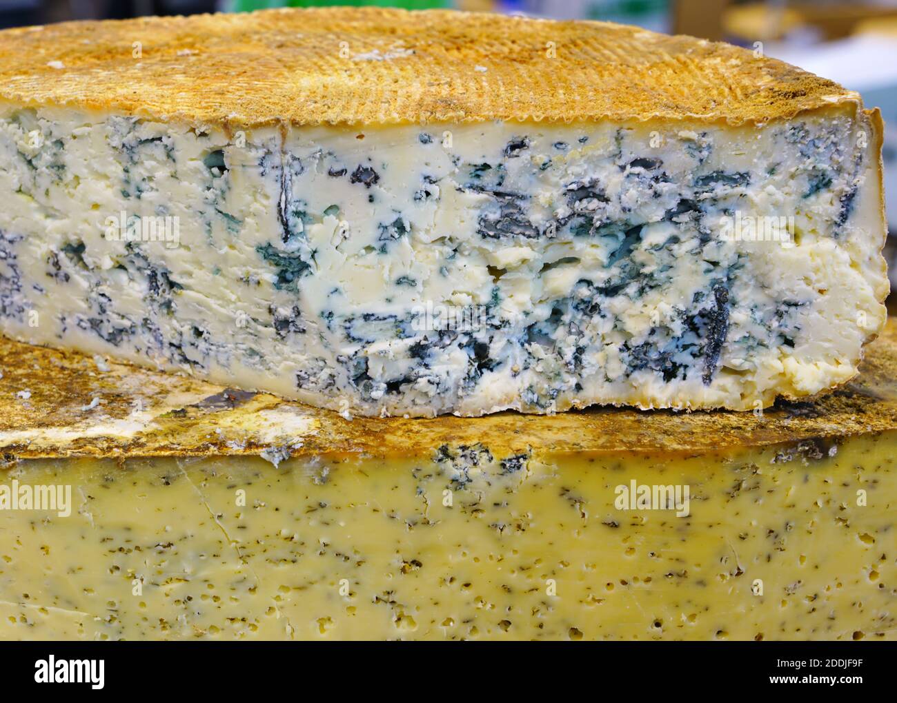 Half wheel of fresh blue cheese at a French market Stock Photo - Alamy